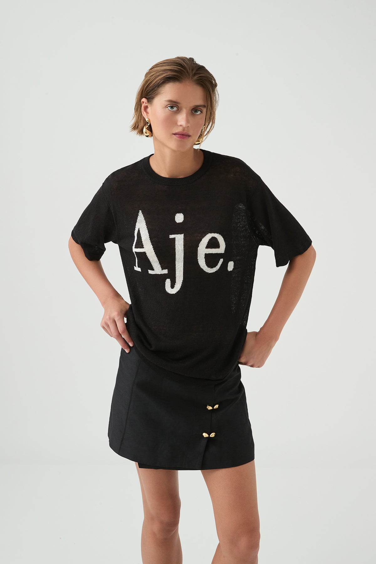 Fascinations Logo Knit Tee | Black & Ivory | Aje – Aje AU